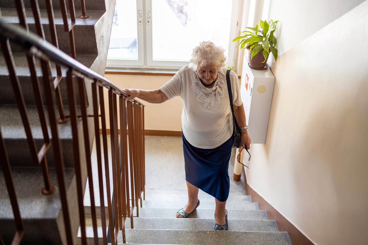 Woman Walking Up Steps